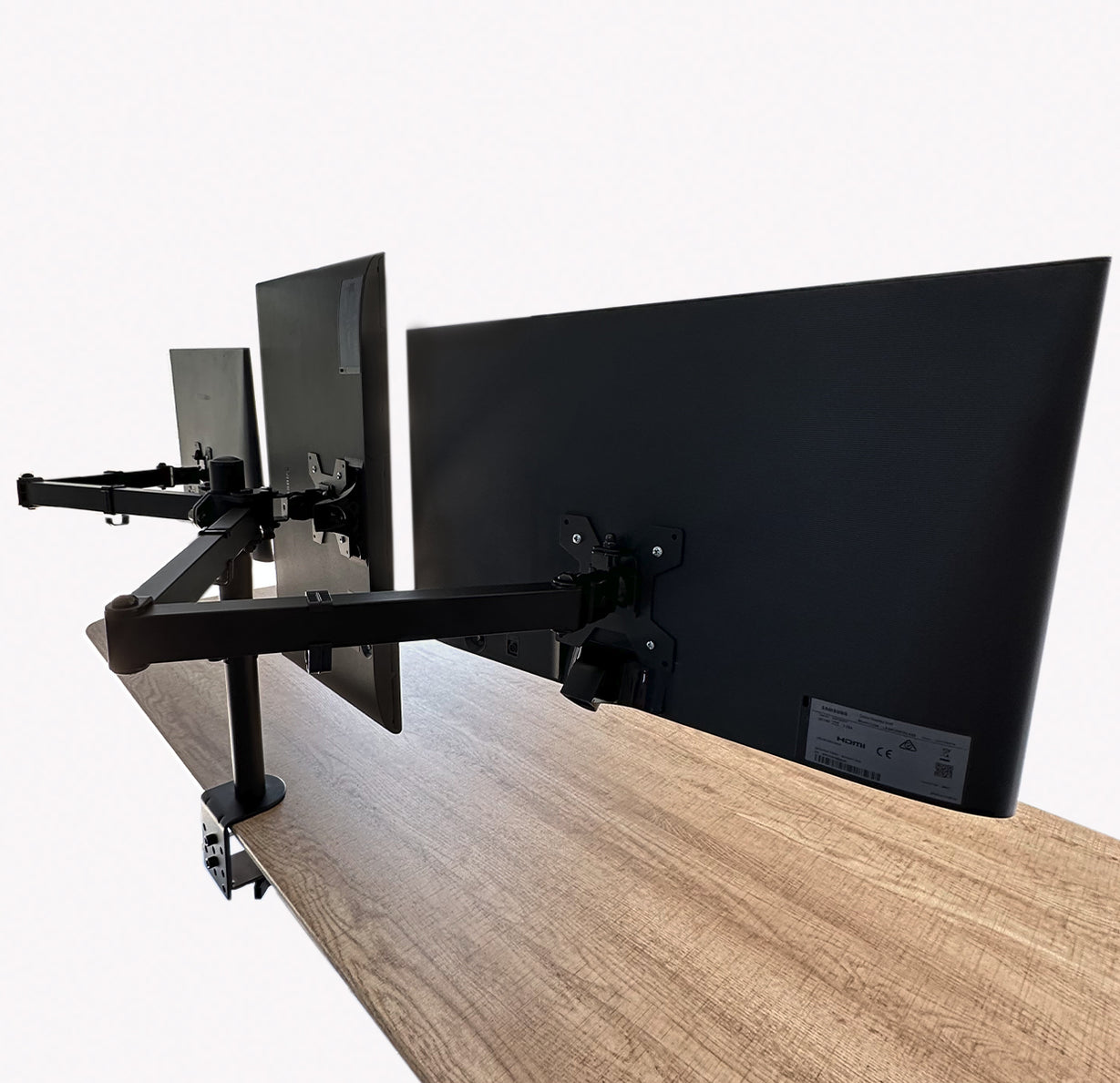 Brazo monitor triple BR05-3 | Ergonomics Chile